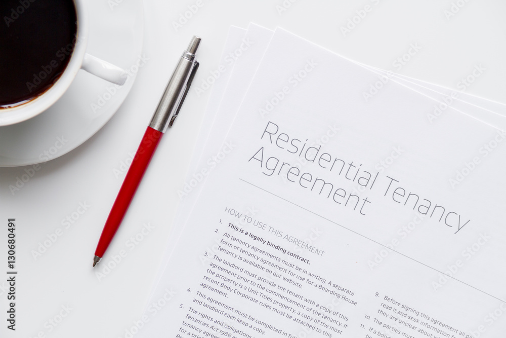 signing of agreement top view on white background Stock Photo | Adobe Stock