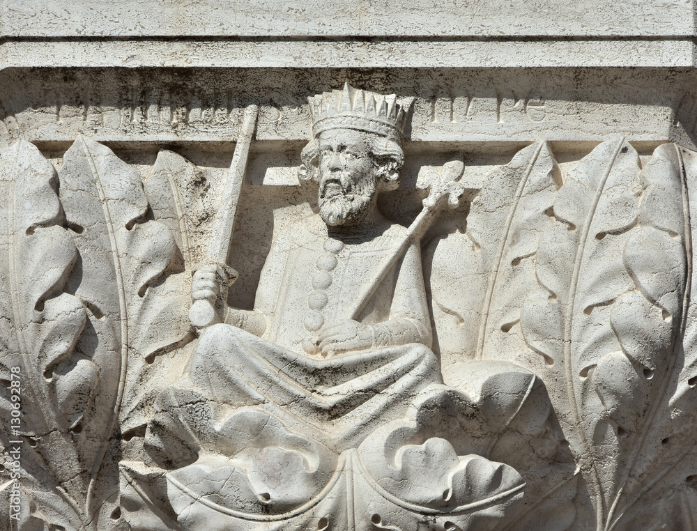 Trajan emperor relief as medieval king with sword and scepter on doge ...