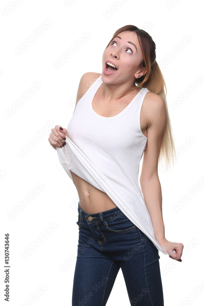 Model pulling her shirt. Close up. White background Stock Photo | Adobe Stock