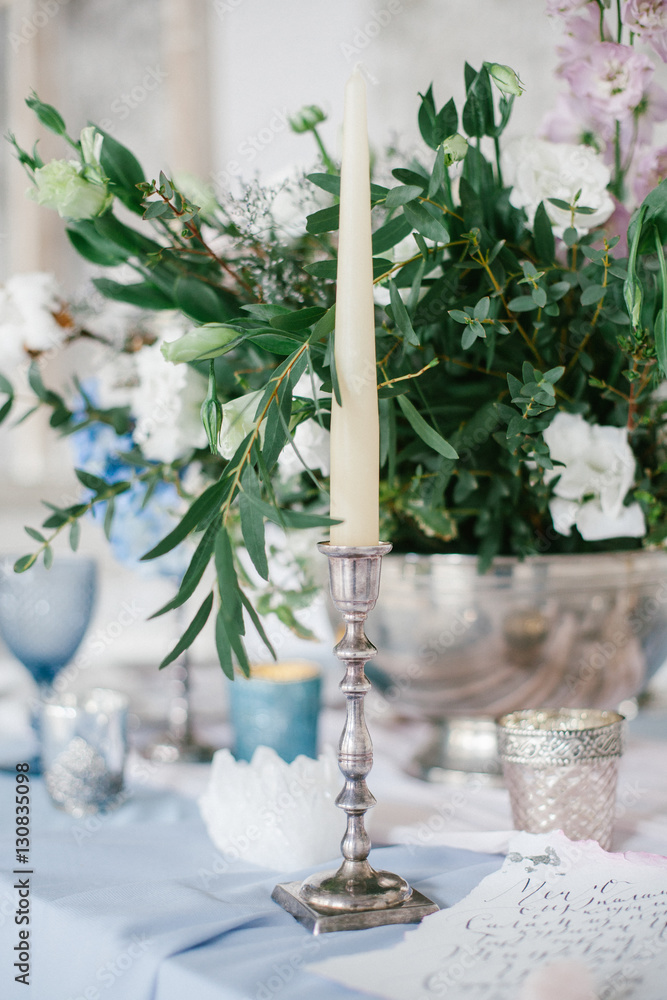 Silver candlestick as element of festive table wedding centerpieces ...
