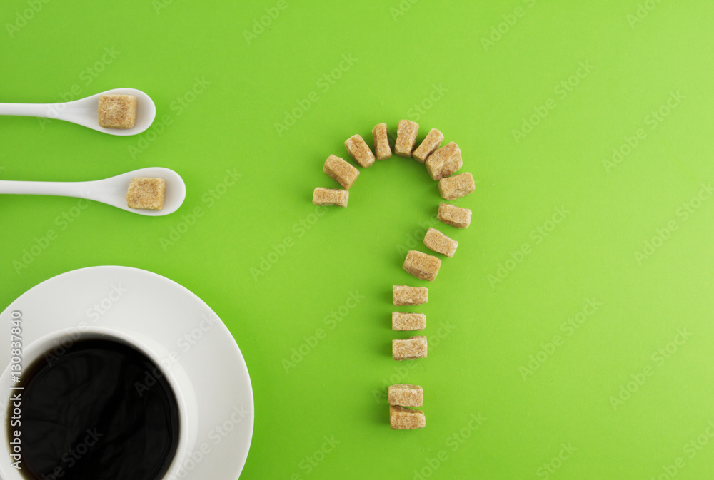 Diet, unhealthy sweet addiction concept. White cup of coffee or tea ...