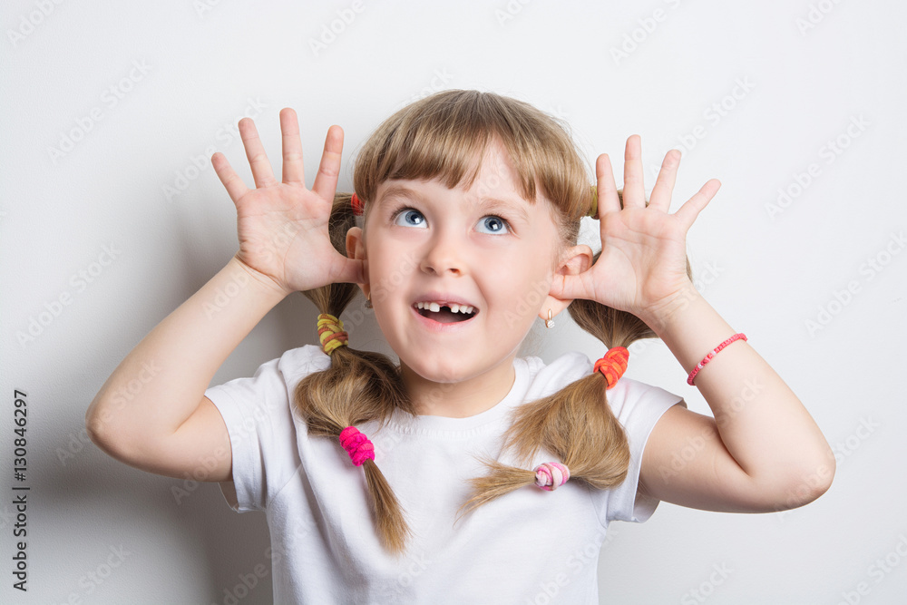 little girl teasing Stock Photo | Adobe Stock