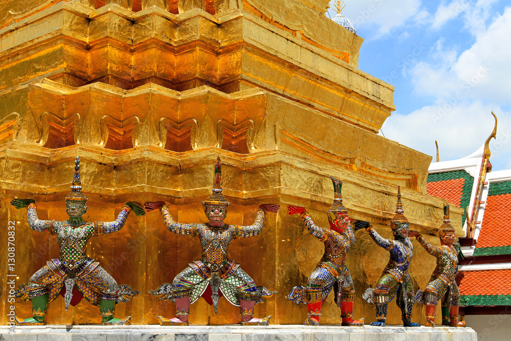 The ramayana giant statues are standing at Wat Ph-ra Kaew Ancient ...