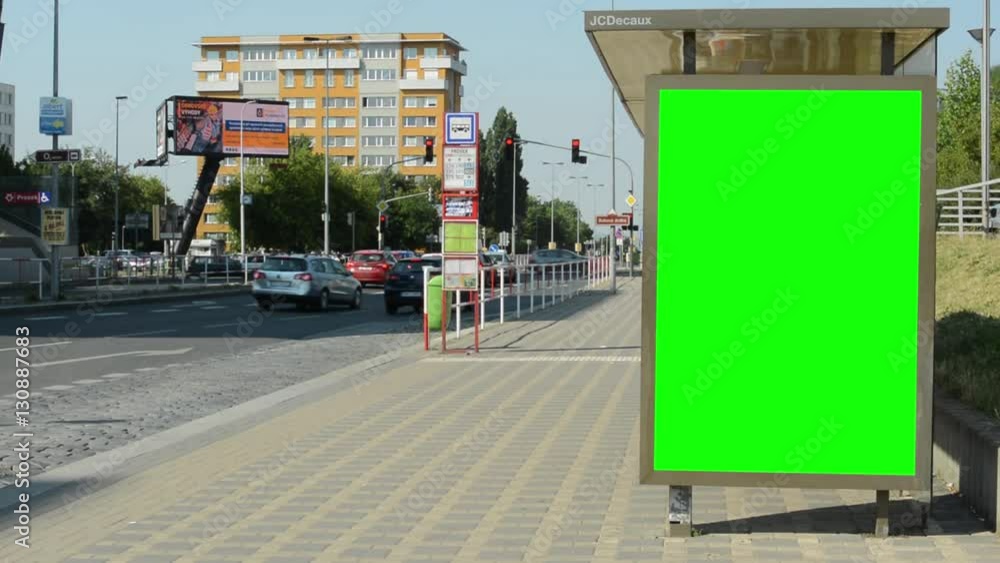 Green screen on the side of a bus stop in an urban area Stock ビデオ ...
