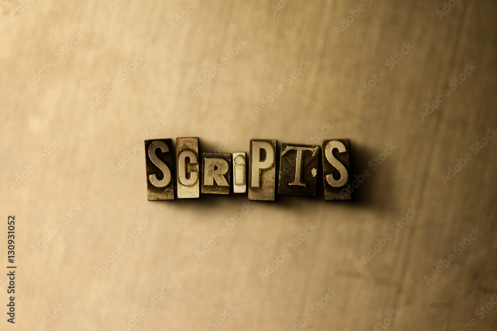 SCRIPTS - close-up of grungy vintage typeset word on metal backdrop ...