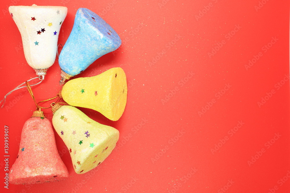 Five pieces of styrofoam bell on a red background for decoration foto ...