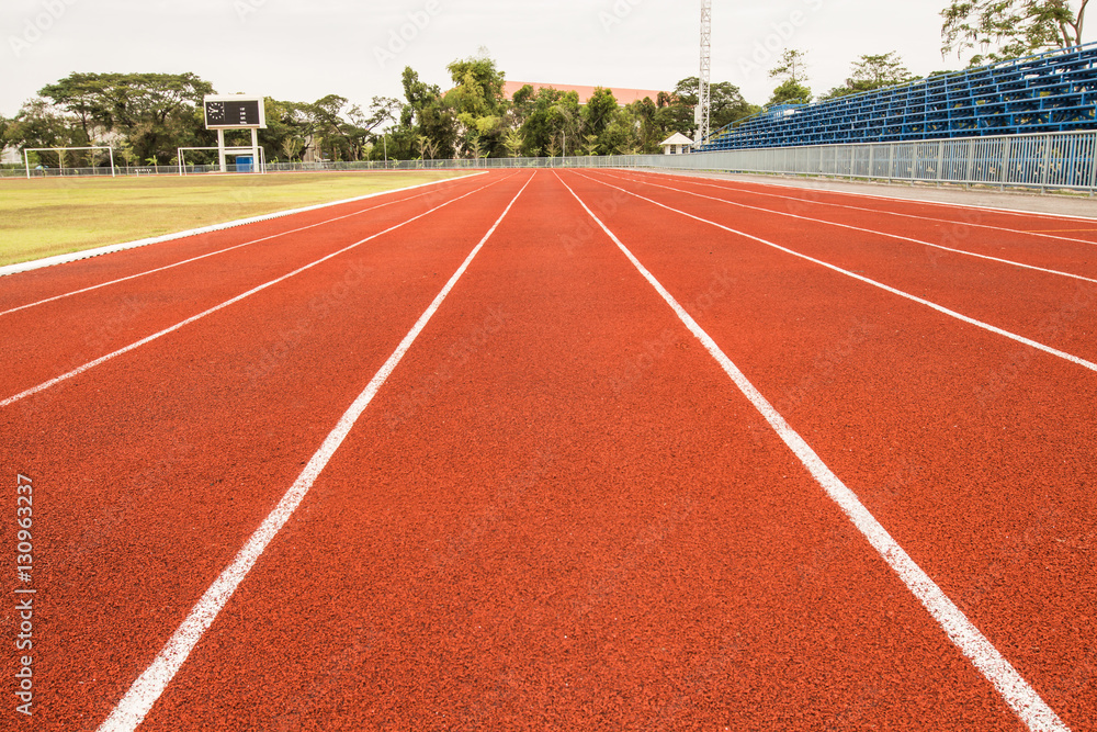 Red racetrack for competition in the stadium. Stock-Foto | Adobe Stock