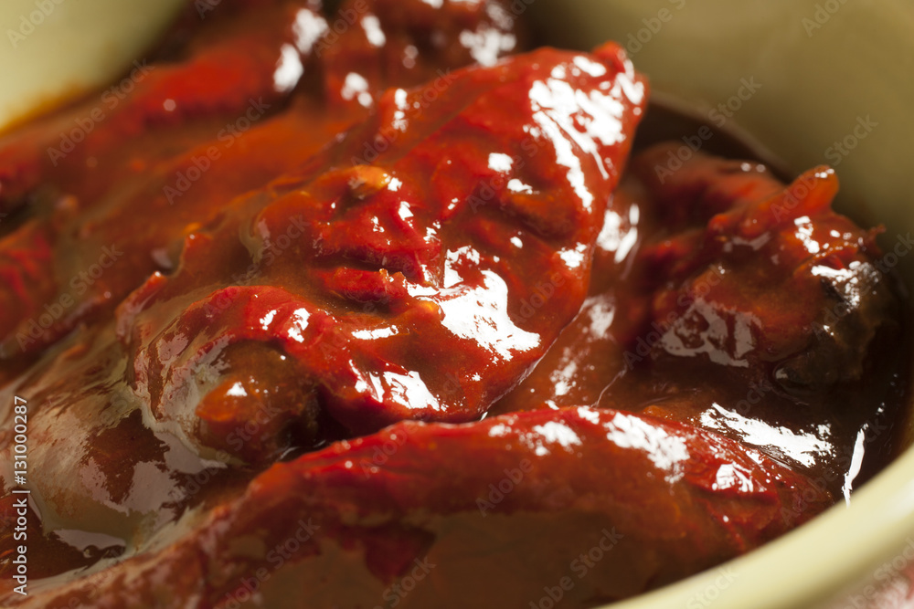 chipotle chiles in adobo sauce Stock Photo | Adobe Stock