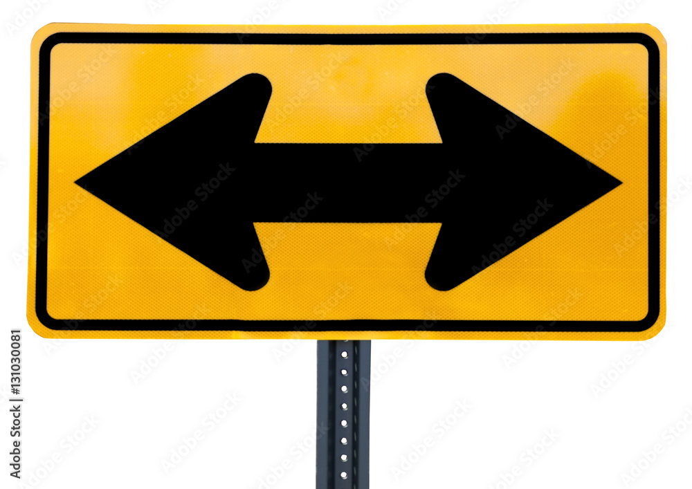 Yellow and black caution sign with arrows pointing in opposite ...