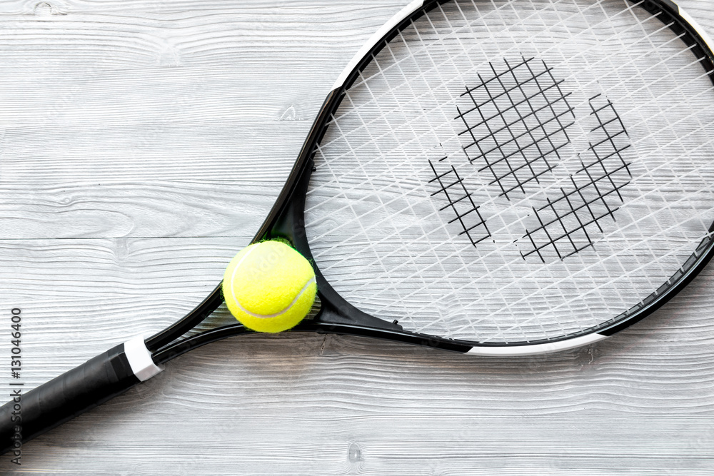 tennis racket on wooden background top view Stock Photo | Adobe Stock