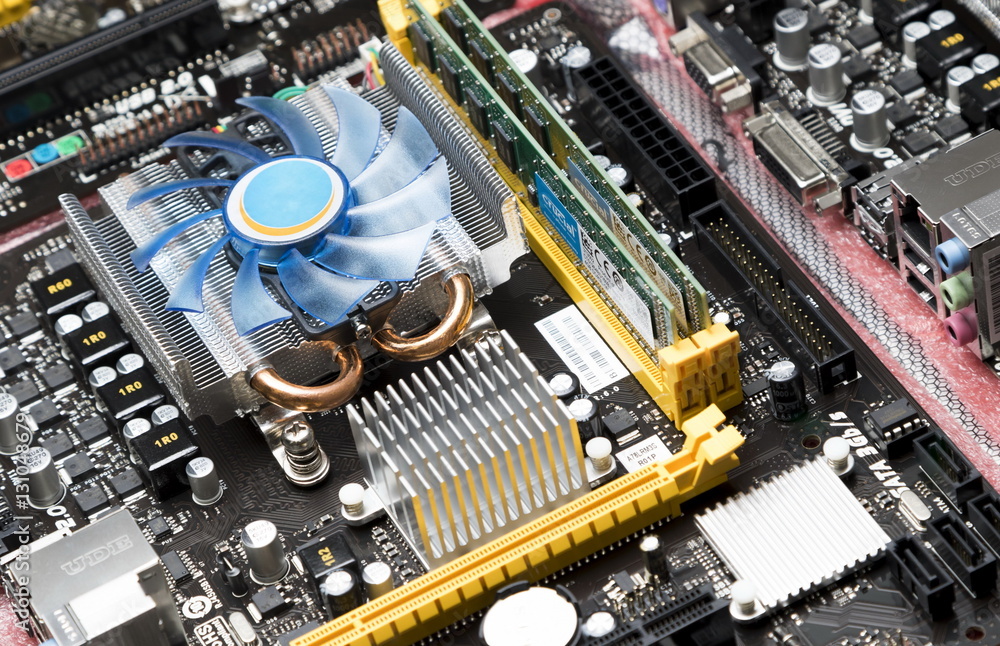 Cpu cooler on motherboard Stock Photo | Adobe Stock