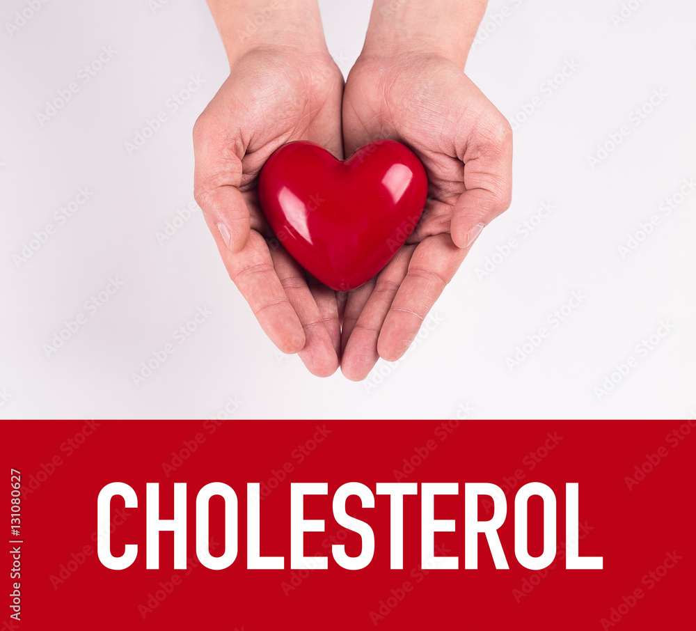 Hand holding heart shape with CHOLESTEROL text Stock Photo | Adobe Stock