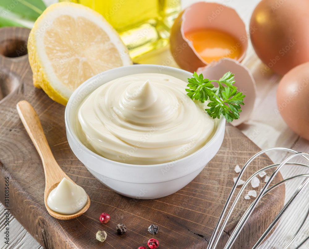 Natural mayonnaise ingredients and the sauce itself. Stock Photo ...