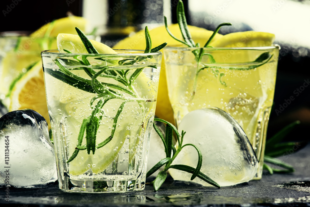 Fizzy lemonade with lemon, rosemary and ice in a shape of a hear Stock ...
