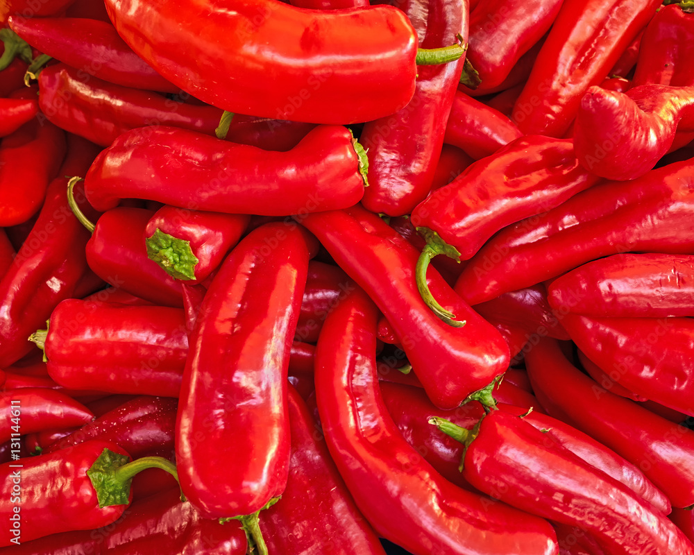 sweet horn peppers closeup, red natural background Stock-Foto | Adobe Stock