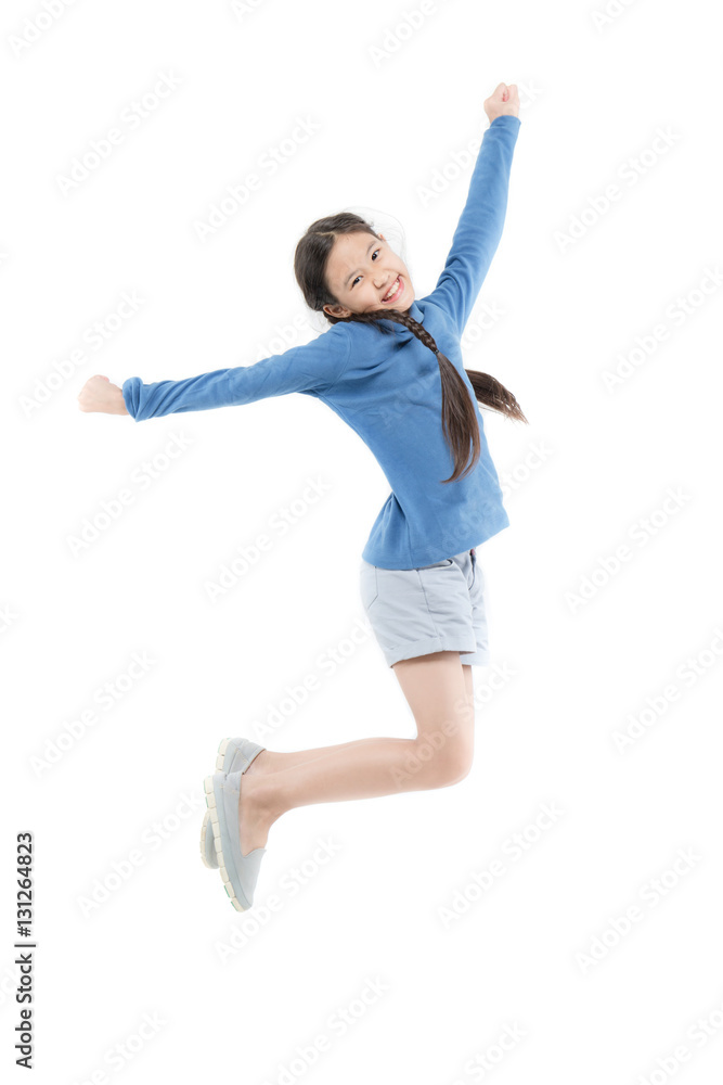Portrait of happy little Asian child girl jumping isolated on white ...