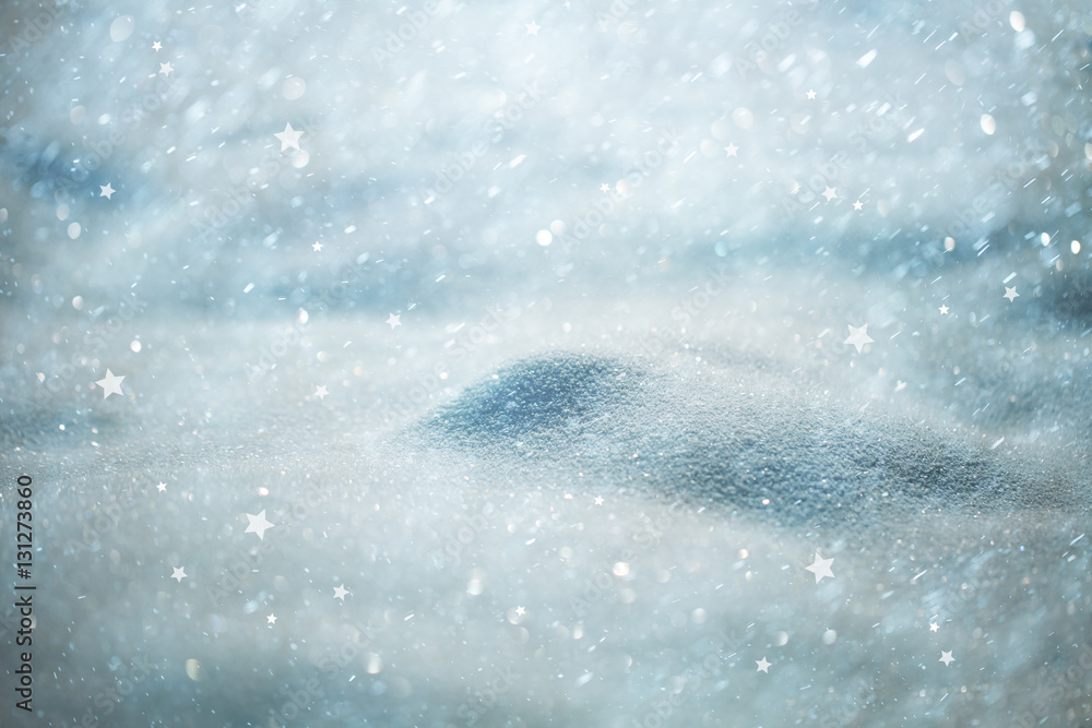 Beautiful blurred soft blue colored snow with abstract star snowfall ...