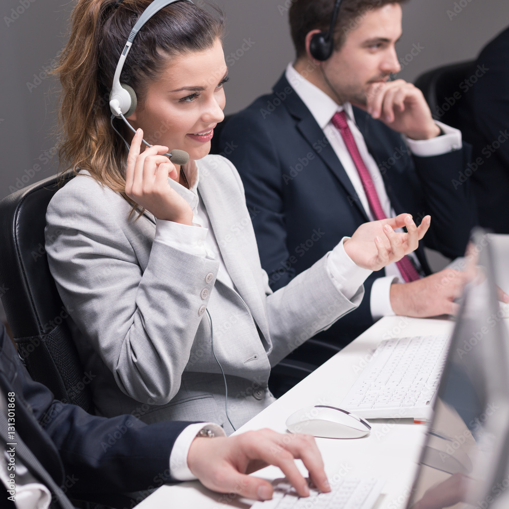 Foto Stock Focused telephone consultants | Adobe Stock