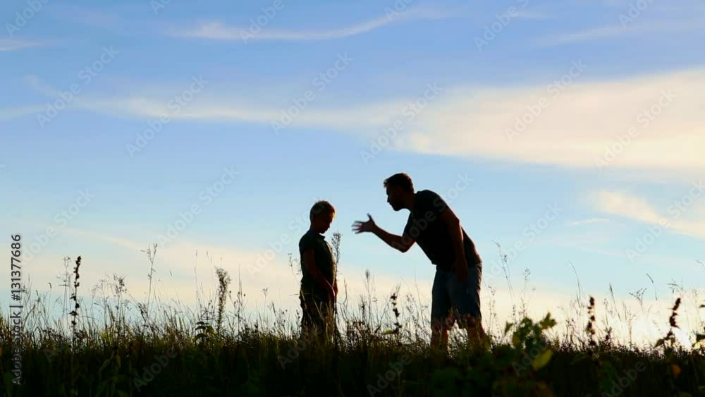 Angry parent and his child over sunset sky background. Anonymous ...