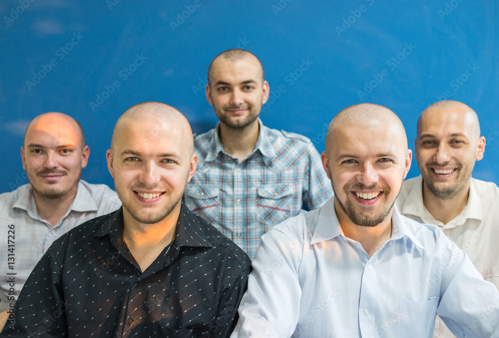 Group portrait of young bald men Stock Photo | Adobe Stock