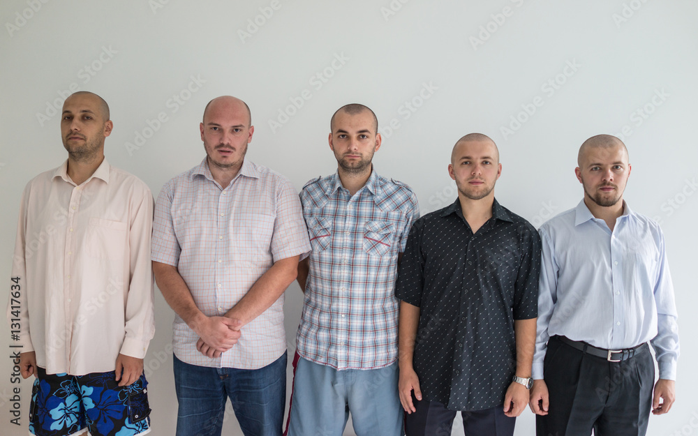Group portrait of young bald men Stock Photo | Adobe Stock