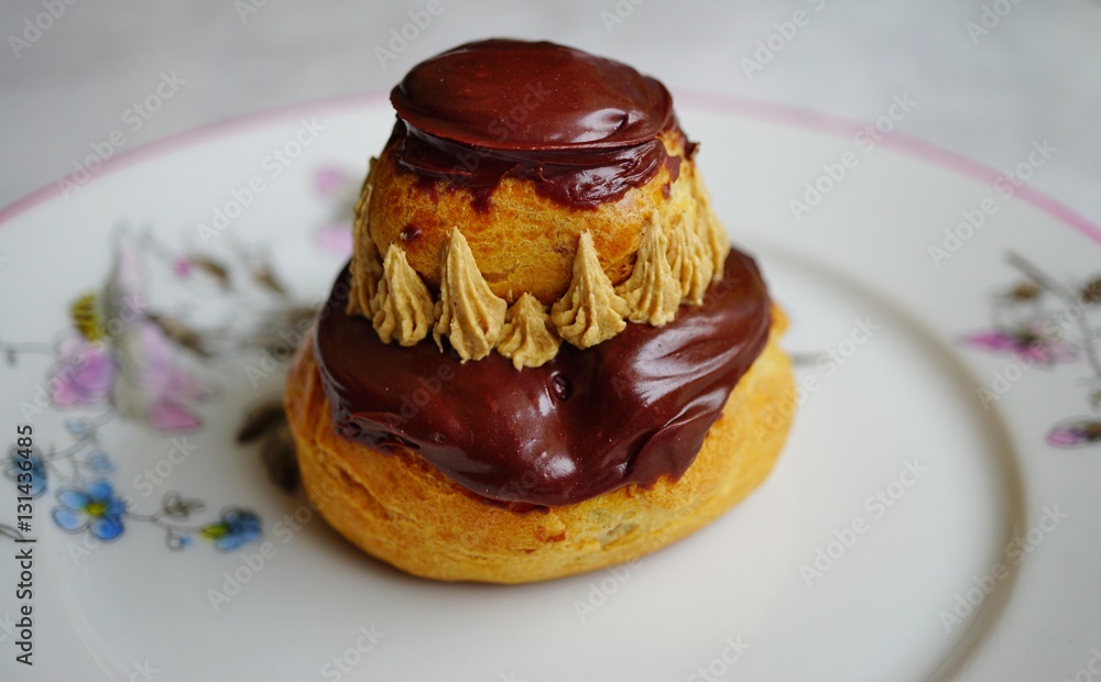 A chocolate religieuse pastry in France Stock-Foto | Adobe Stock