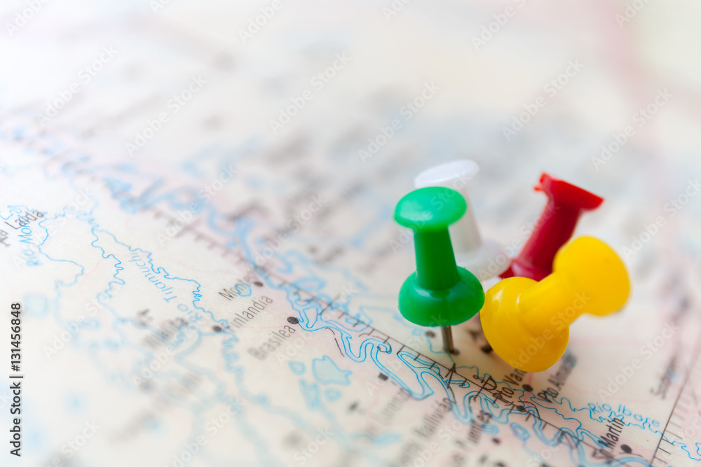 Travel destination points on a map indicated with colorful thumbtacks ...