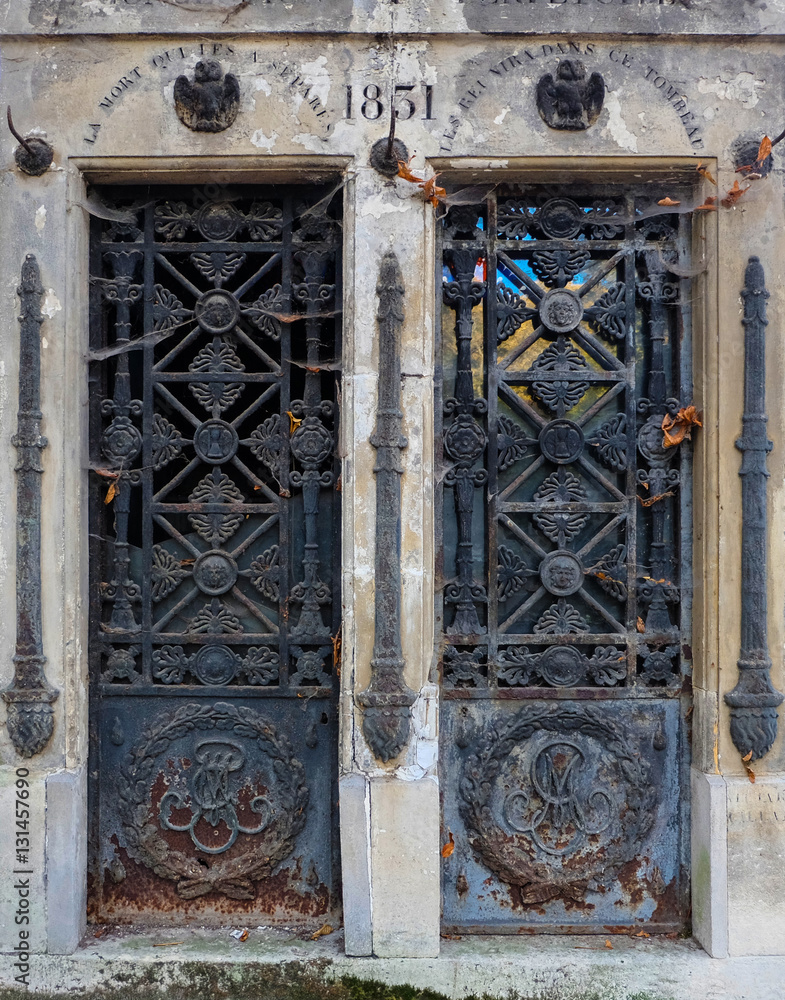 Twin door - two rusty blue rectangular ornate steel doors. Seperate ...