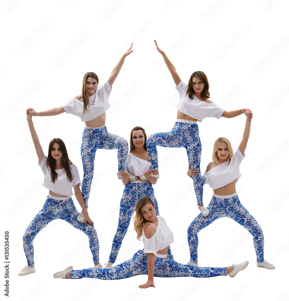 Sexy girl dance group posing in costumes in studio 스톡 사진 | Adobe Stock