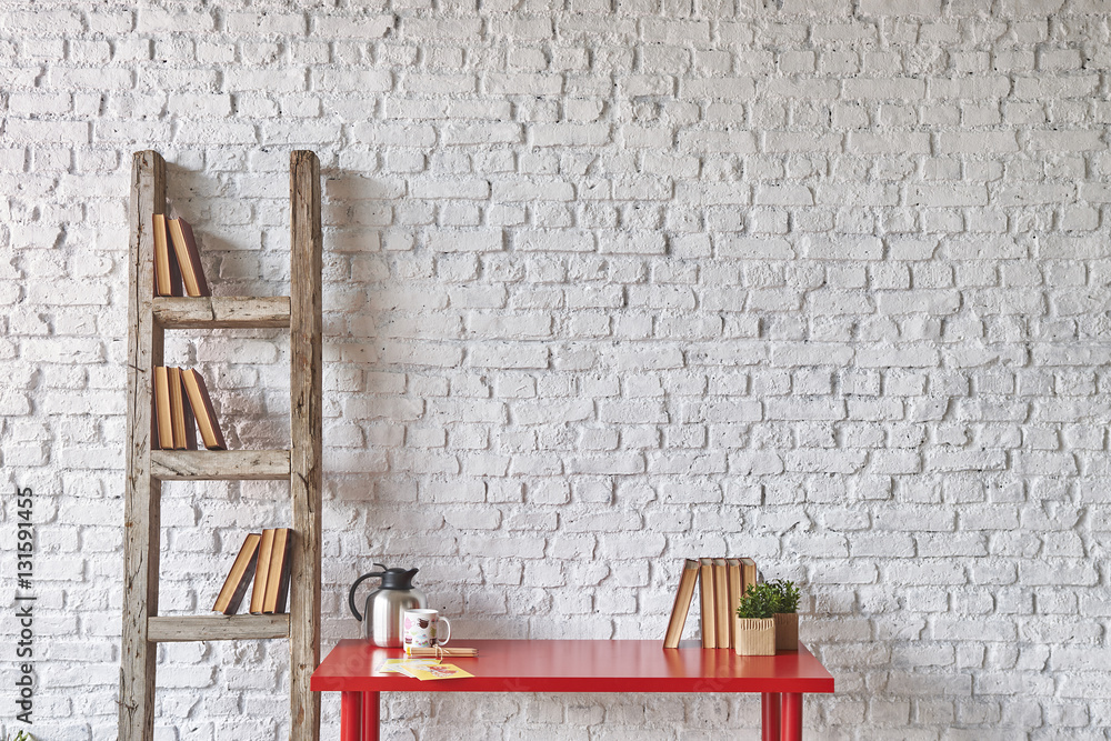 white brick wall and red table concept Stock Photo | Adobe Stock