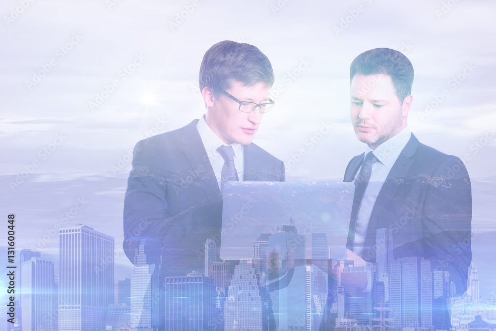 Handsome men using laptop Stock Photo | Adobe Stock