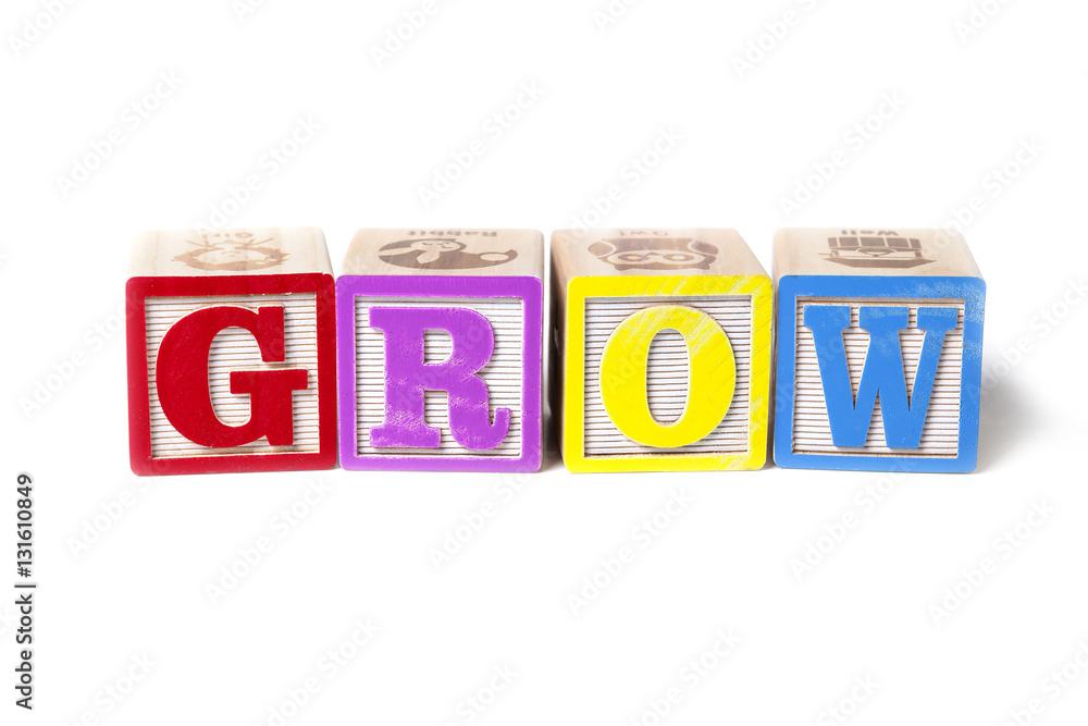 Alphabet blocks spelling the word Grow, isolated on white background ...