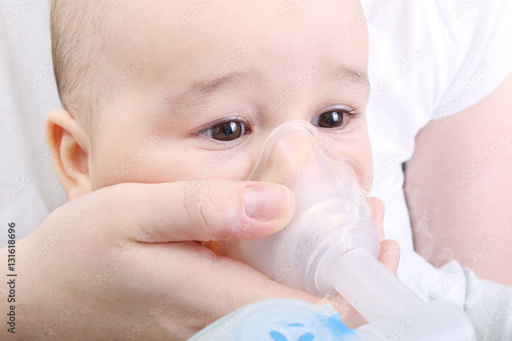 Baby boy at the hospital gets inhaler treatment for cough Stock Photo ...