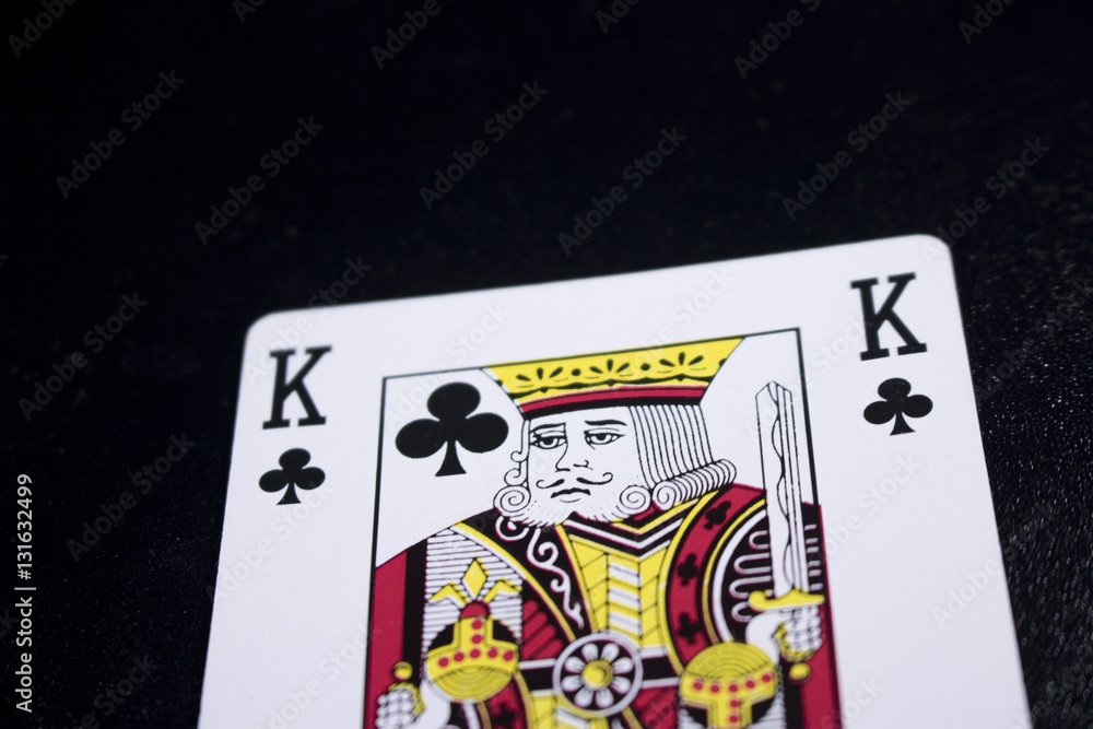 king poker card on dark black background Stock Photo | Adobe Stock