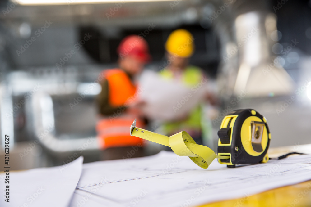 Construction meter tied into a knot. Development and construction ...