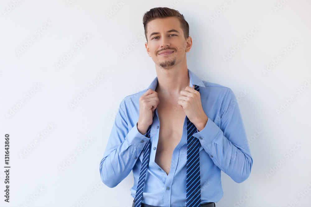 Content Young Handsome Business Man Undressing Stock Photo | Adobe Stock