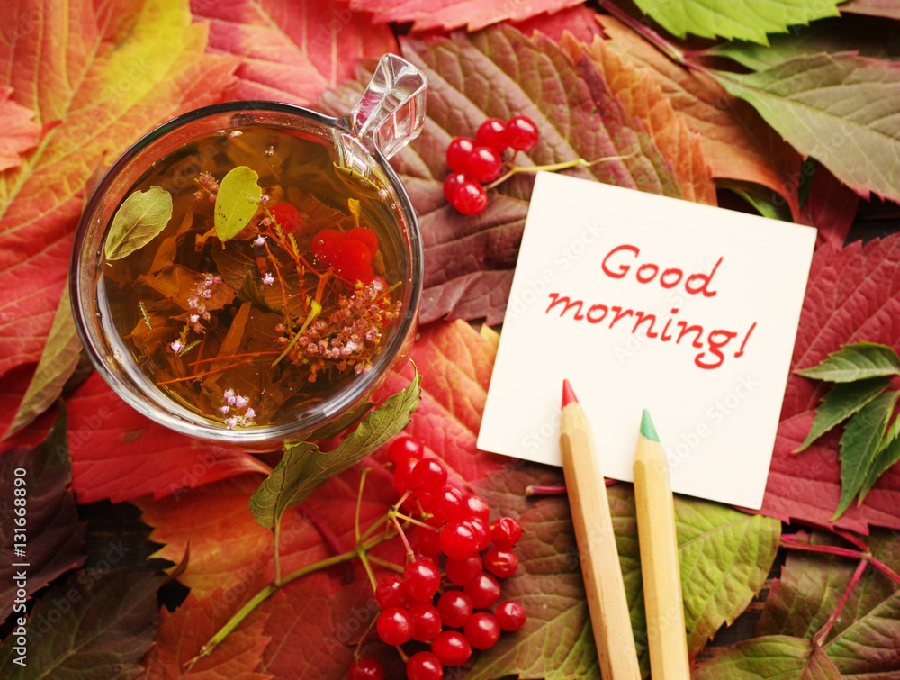 Foto de Good morning - the text on a white card and a cup of tea with ...