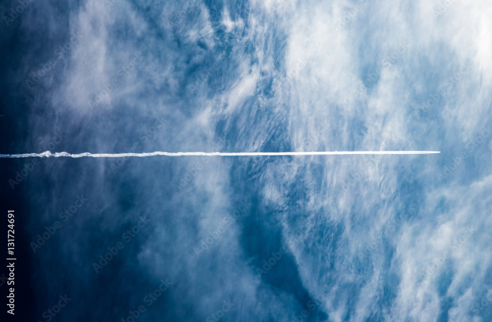Jumbo jet plane straight fast flying under sky Stock Photo | Adobe Stock