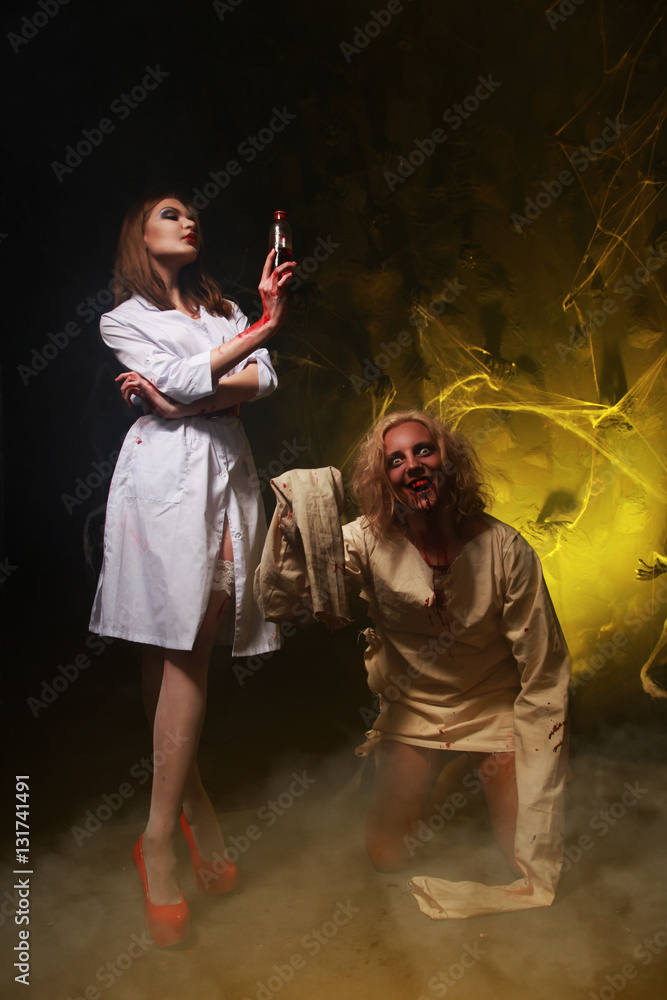 crazy medical couple. beautiful woman doctor and insane mentally ill ...