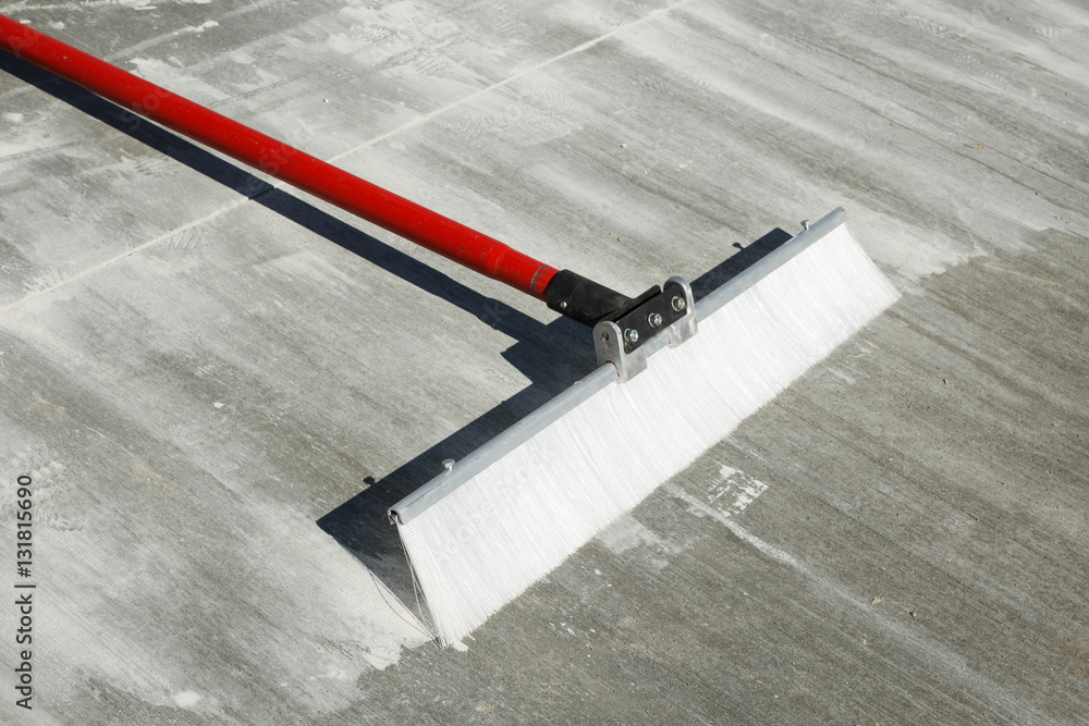 Concrete finishing broom with plastic bristles and red handle Stock ...