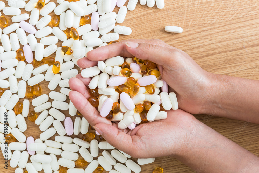 Pills in hand Stock Photo | Adobe Stock