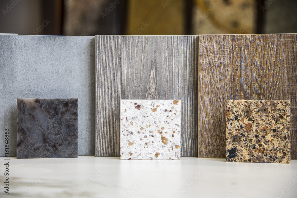Three different granite countertop color samples standing close to ...