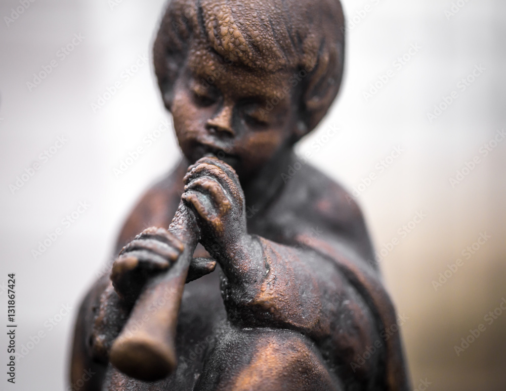 Statues of children playing musical instruments Stock Photo | Adobe Stock