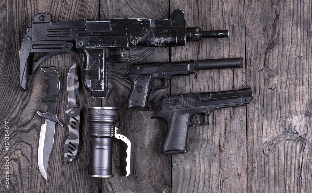 gun and two pistols,UZI submachine gun,firearms, terrorism Stock Photo ...