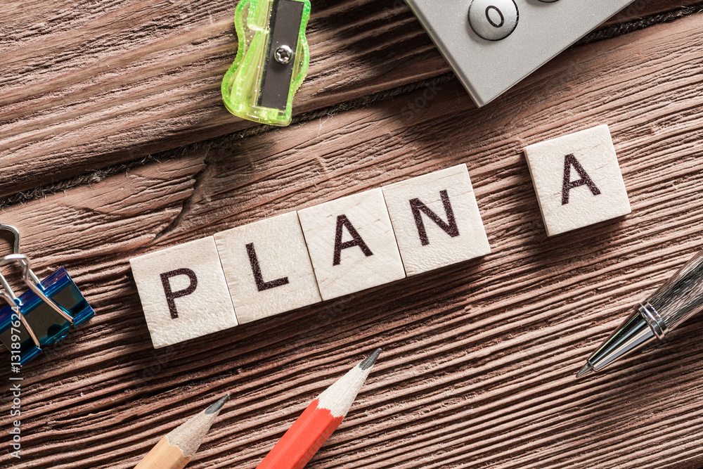 Conceptual business keywords on table with elements of game making ...