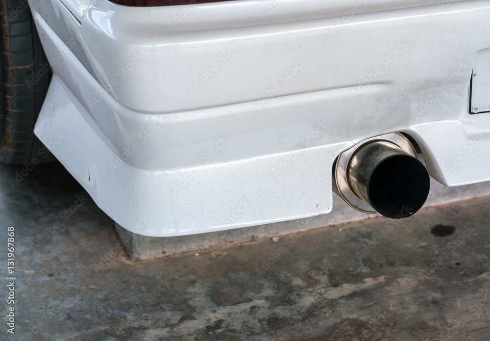 Car exhaust pipe muffler rejecting carbon dioxide. exhaust pipe of a ...