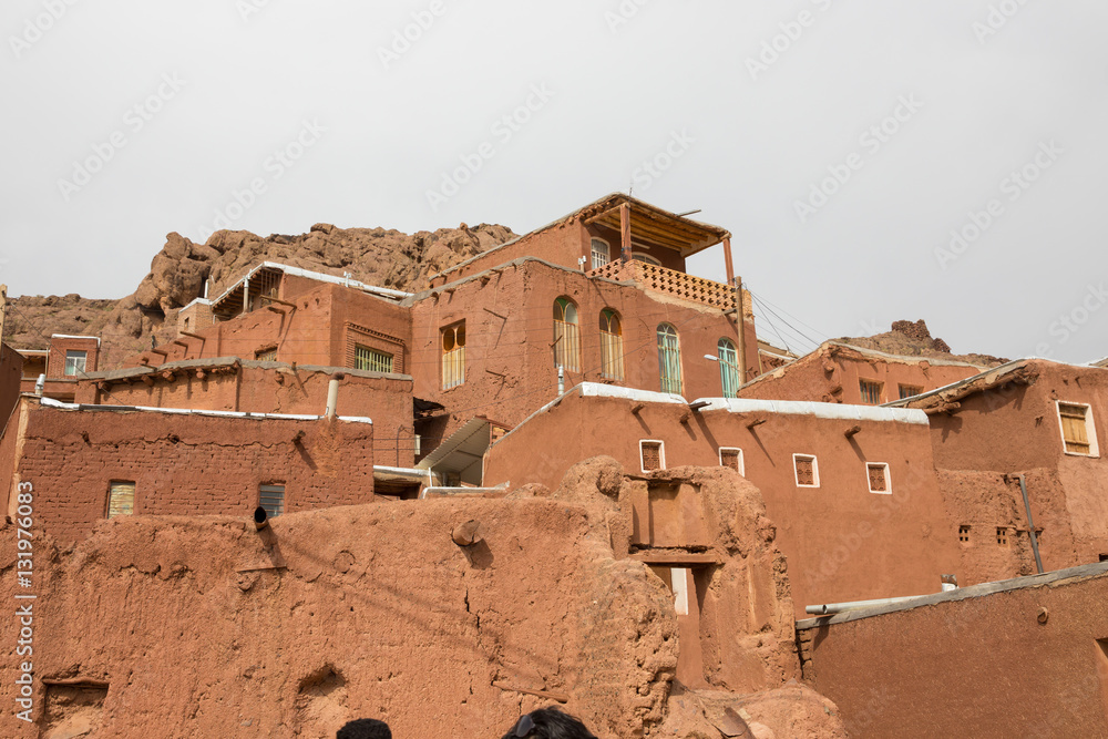 The tipical red mud-brick houses in the ancient village of Abyan, in ...
