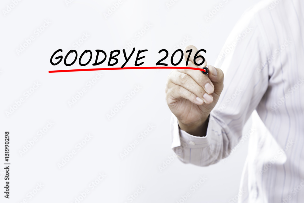 Businessman hand writing goodbye 2016 with red marker on transpa Stock ...