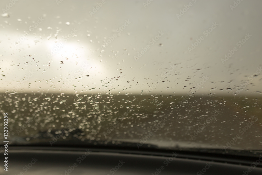 raindrops on a windshield of car Stock Photo | Adobe Stock