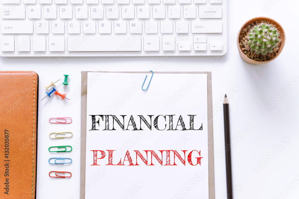 Text Financial planner on white paper background / business concept ...